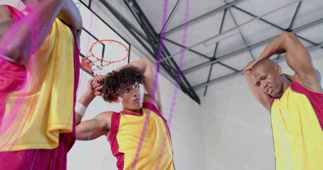 Basketball Players Stretching in Gym Before Game - Free Stock Photo ...