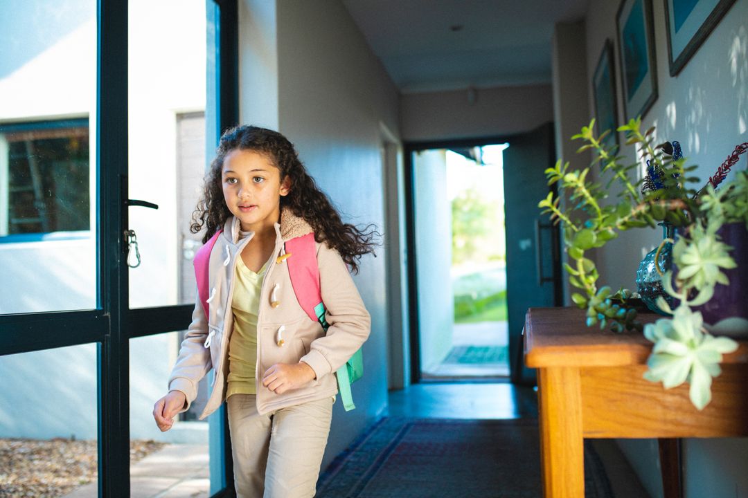 Young Girl Returning Home with Backpack After School Day - Free Stock ...