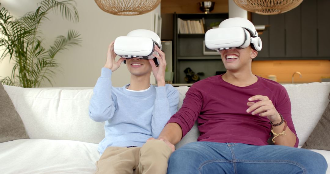 Friends Enjoying Virtual Reality Gaming in Modern Living Room - Free ...