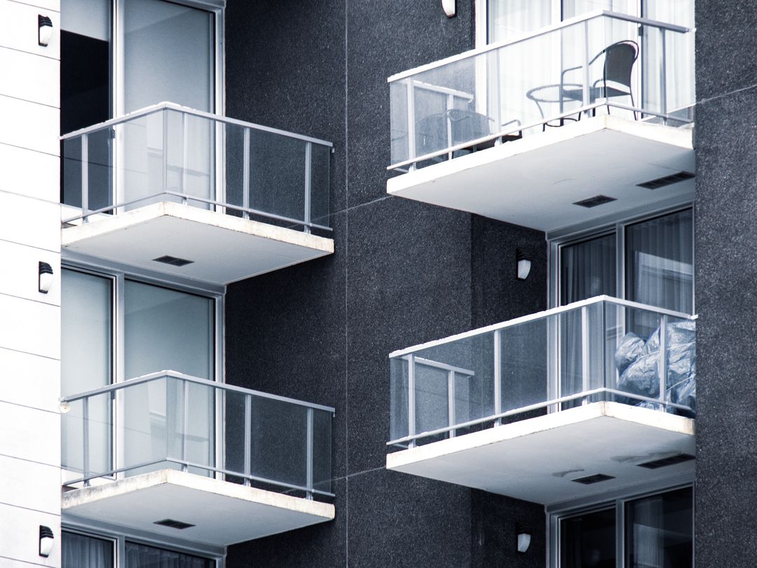 Modern condo apartment balconies with glass railings - Free Stock Photo ...