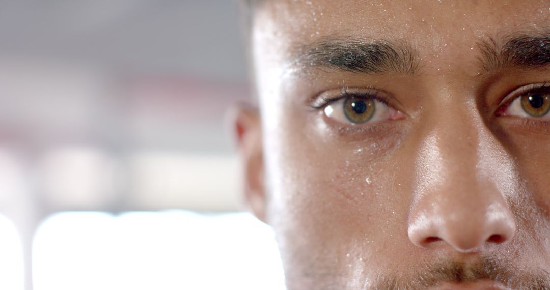 Determined Young Man with Focused Eyes Sweating Post-Workout - Free ...
