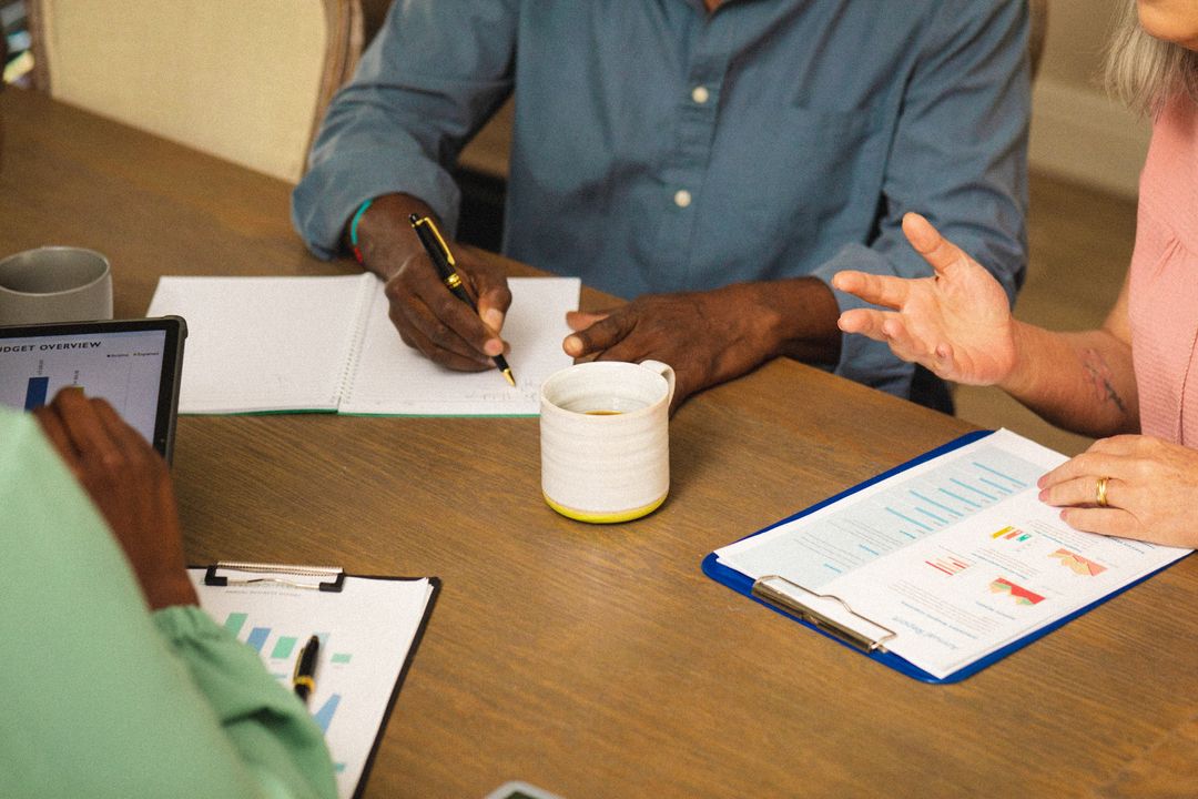 Collaborative Business Meeting with Diverse Senior Couple - Free Stock ...