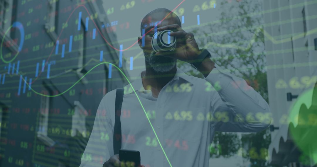 African american businessman analyzing financial data with smartphone ...