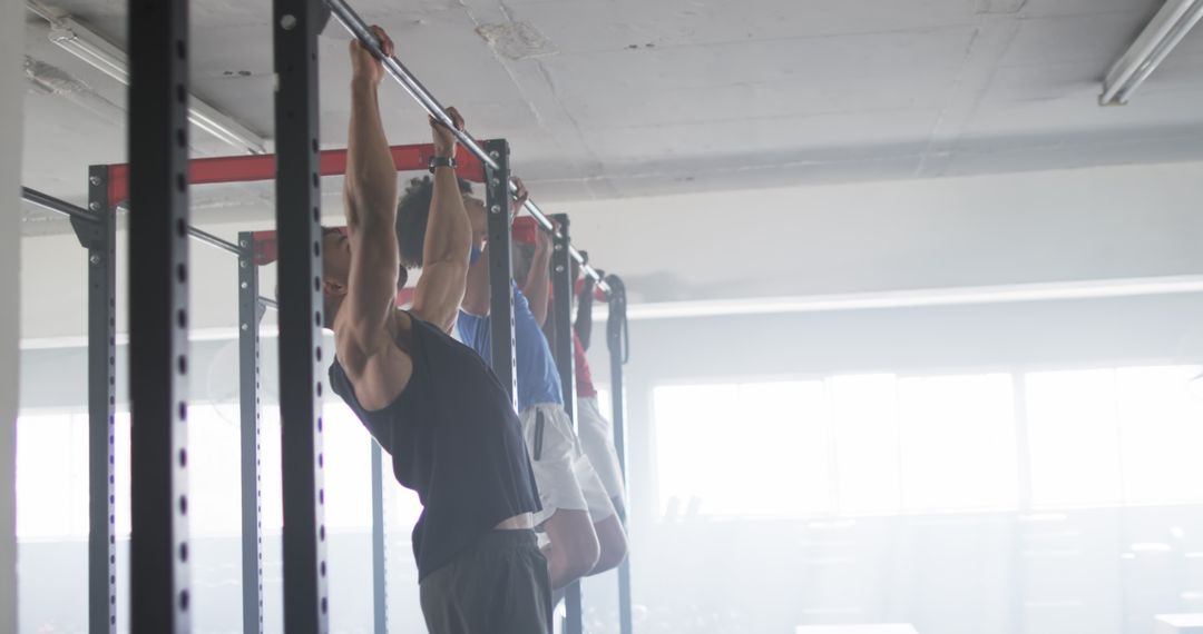 Men Performing Pull-Ups in Gym for Strength Training - Free Stock Photo ...