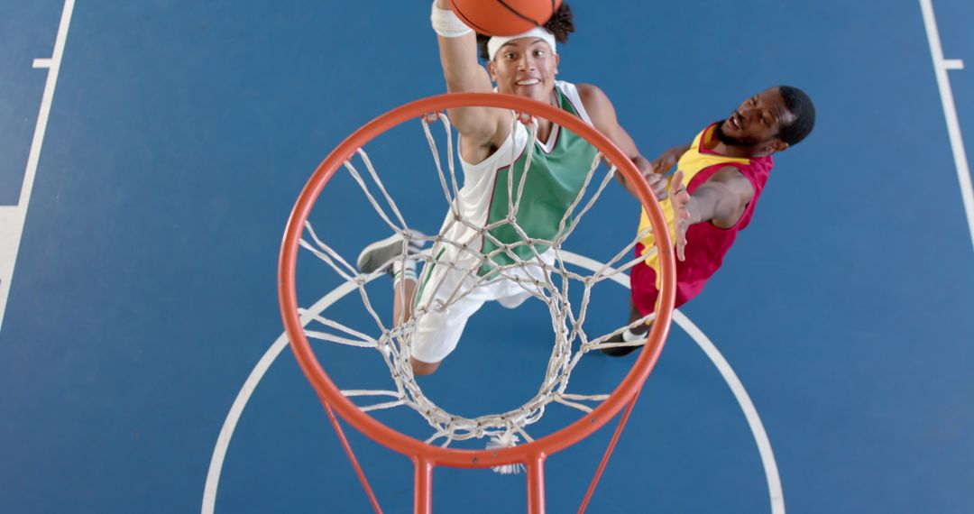 Dynamic Basketball Slam Dunk on Outdoor Court