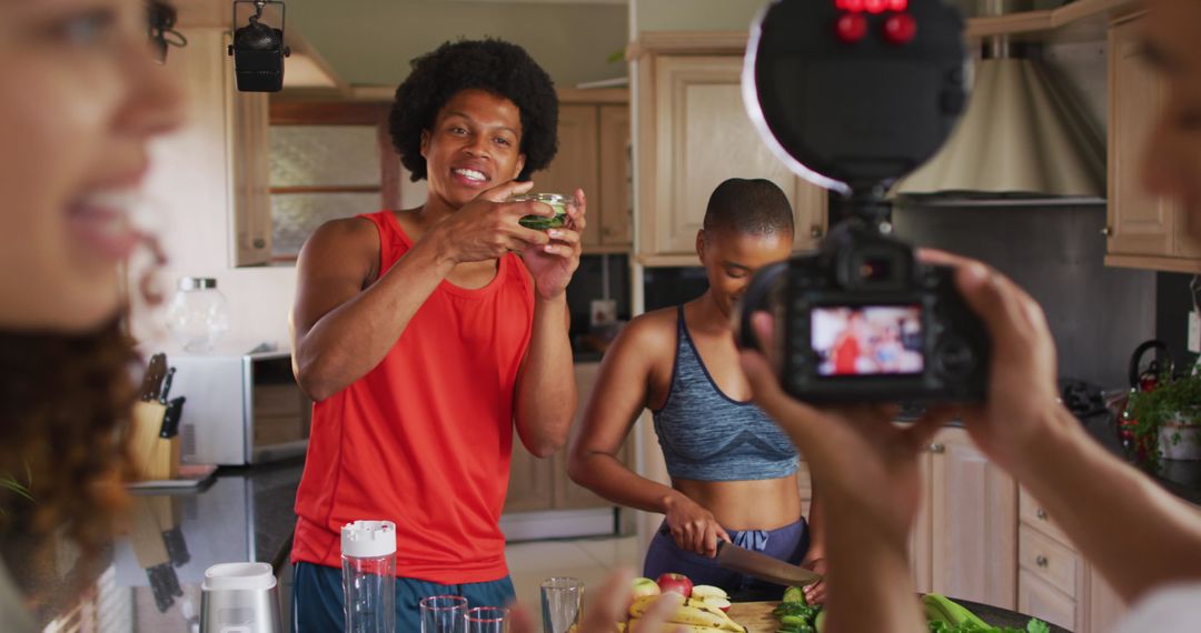 Friends filming culinary blog in modern kitchen environment - Free ...