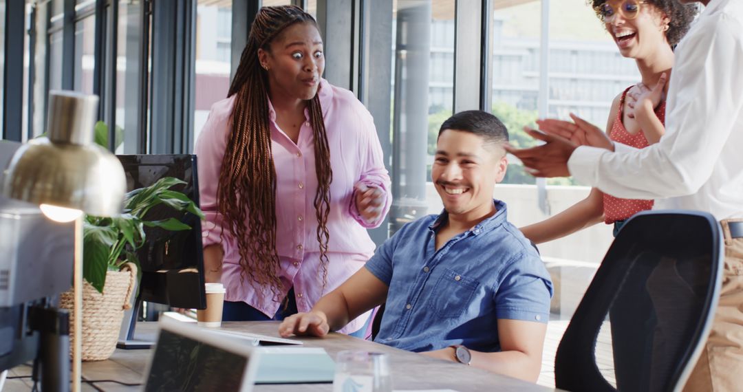 Team celebrating success smiling excitement workplace - Free Stock ...