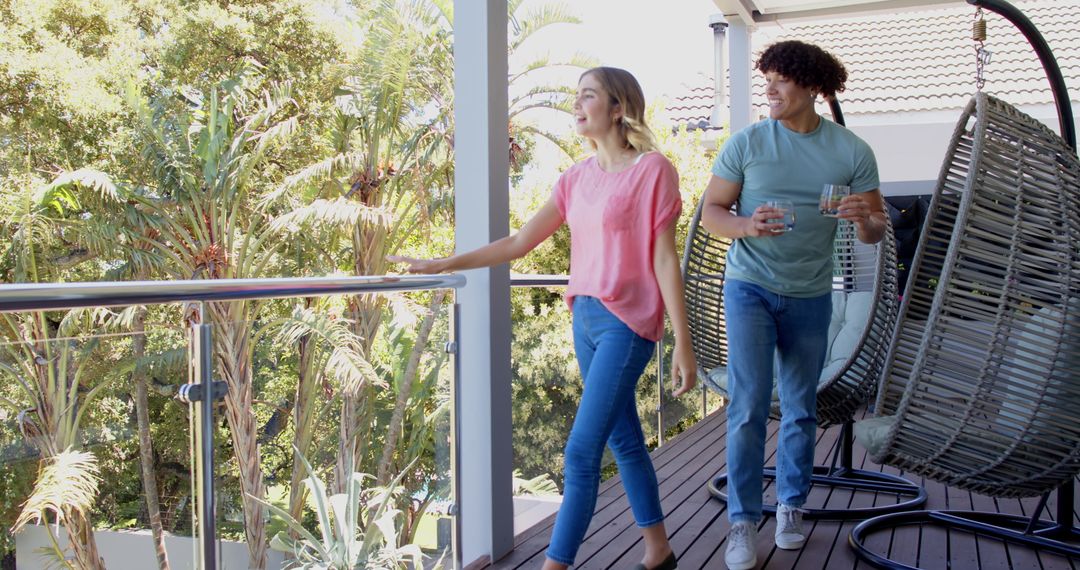 Romantic Balcony Proposal with Joyful Couple Outdoors - Free Stock ...