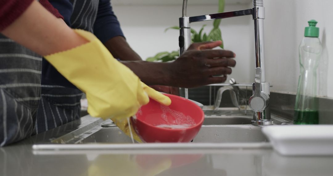 Diverse Couple Washing Dishes Together in Kitchen - Free Stock Photo ...