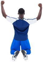 Football Player Kneeling in Victory with Clenched Fists Raised ...