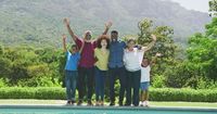 Happy Family of BIPOC Couples with Generations Having Fun in Garden ...