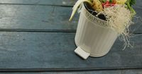 White Compost Bin with Organic Matter on Rustic Wood Surface - Download ...