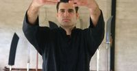Caucasian Male Balancing Sword in Martial Arts Dojo - Download Free ...