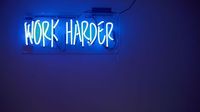 Neon Work Harder Sign in Dark Room - Download Free Image from Pikwizard