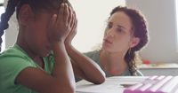 Teacher Comforting Upset Student During Lesson - Download Free Image ...