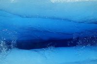 Close-Up of Deep Blue Ethereal Ice Layers and Bubbles from Pikwizard