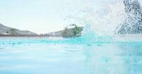 Dramatic Water Splash in Outdoor Pool with Scenic Background - Download ...