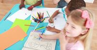 Happy Diverse Preschool Children Drawing in Classroom Setting ...