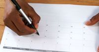 Hand Filling Out Calendar for Organized Planning - Download Free Image ...