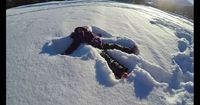 Child Making Snow Angel in Winter Wonderland - Download Free Image from ...
