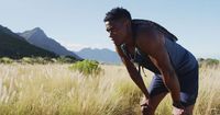 Athlete Resting After Intense Trail Run in Mountain Landscape ...