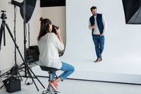 Male Model Posing for Photographer in Professional Studio - Download ...