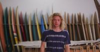 Surfboard Maker in Artisan Workshop Surrounded by Colorful Boards ...