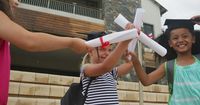 Diverse Girls Celebrating Primary School Graduation Outdoors - Download ...