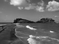 Scenic Black and White Beach Landscape with Islands and Waves ...
