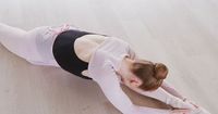 Ballet Dancer Stretches in Splits Pose on Studio Floor - Download Free ...